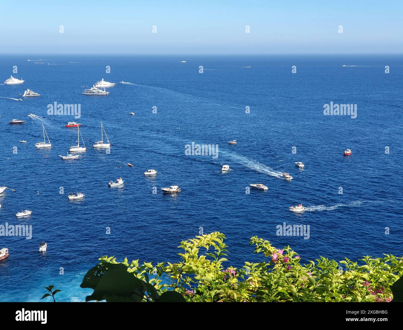 Blue Ocean at Positano Bay with Yachts and Sail Boats and Blooming ...