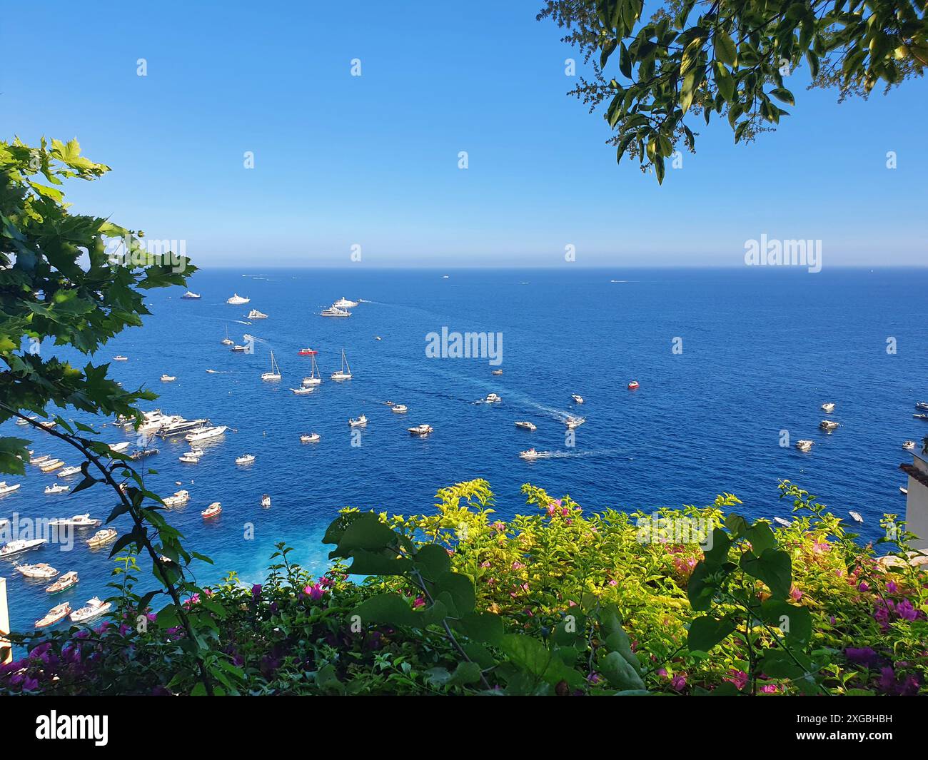Blue Ocean at Positano Bay with Yachts and Sail Boats and Blooming ...