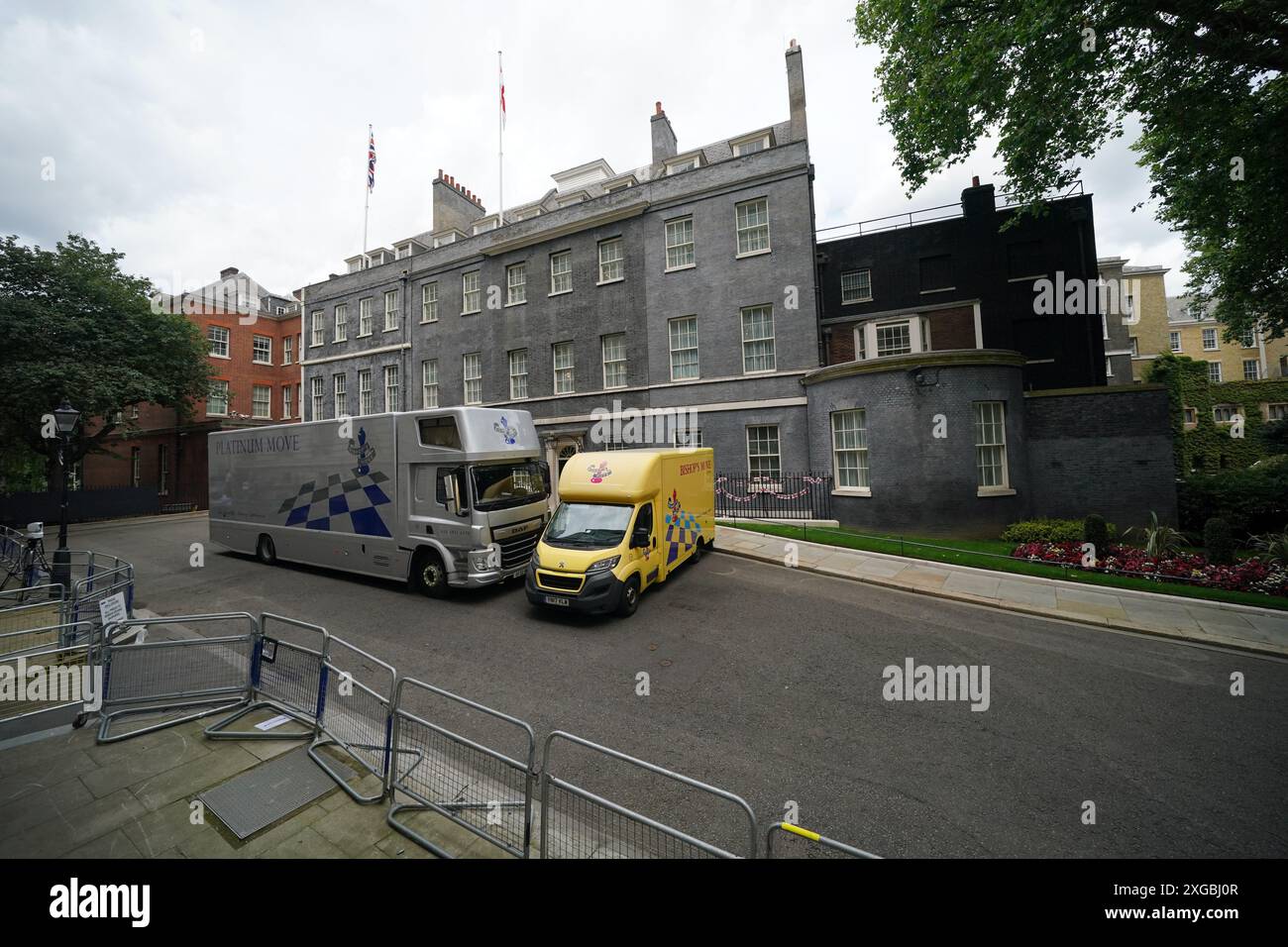 Removal vans from Bishop's Move in Downing Street, London, following ...