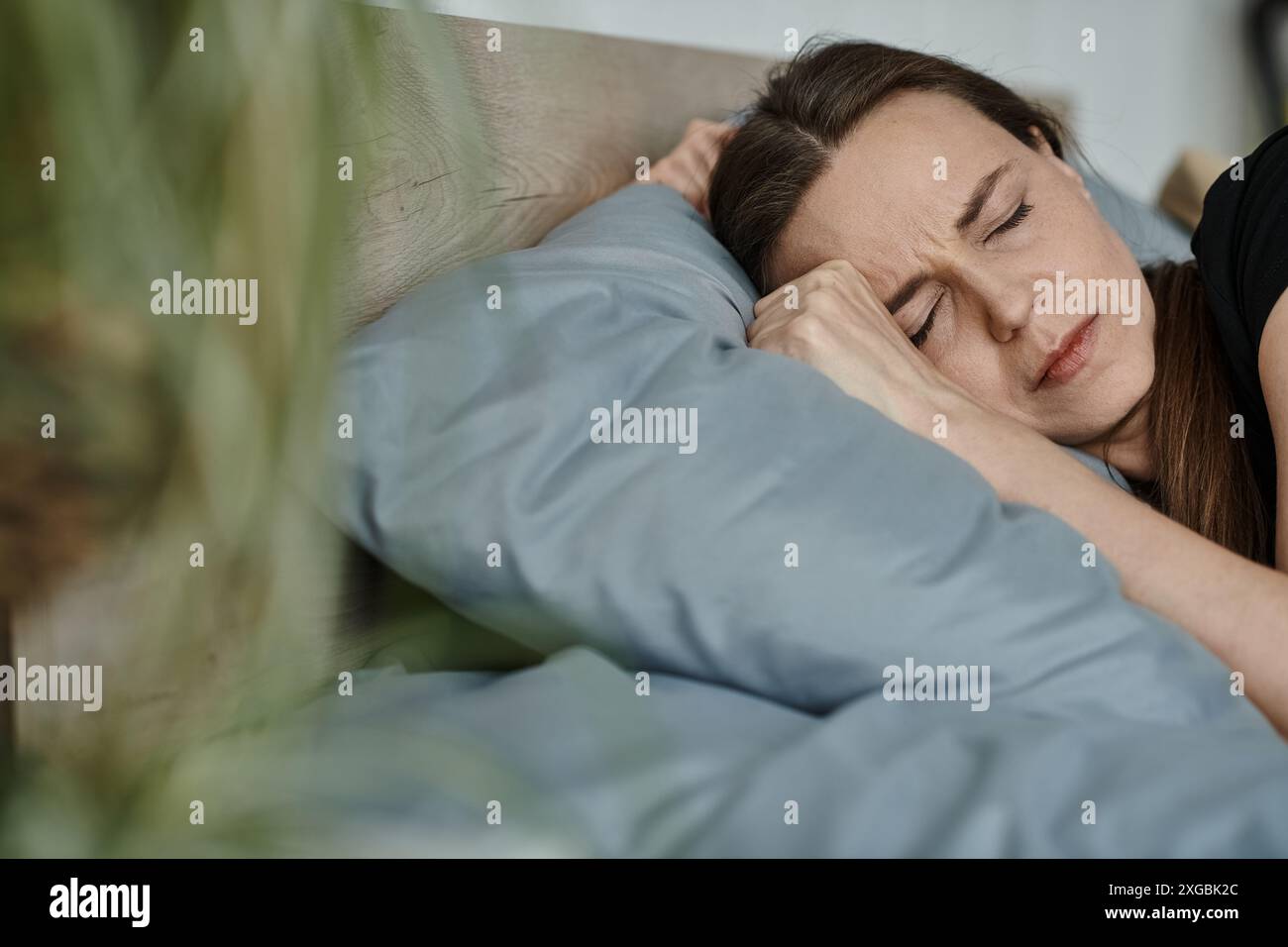 Contemplative woman sitting peacefully on hi-res stock photography and ...