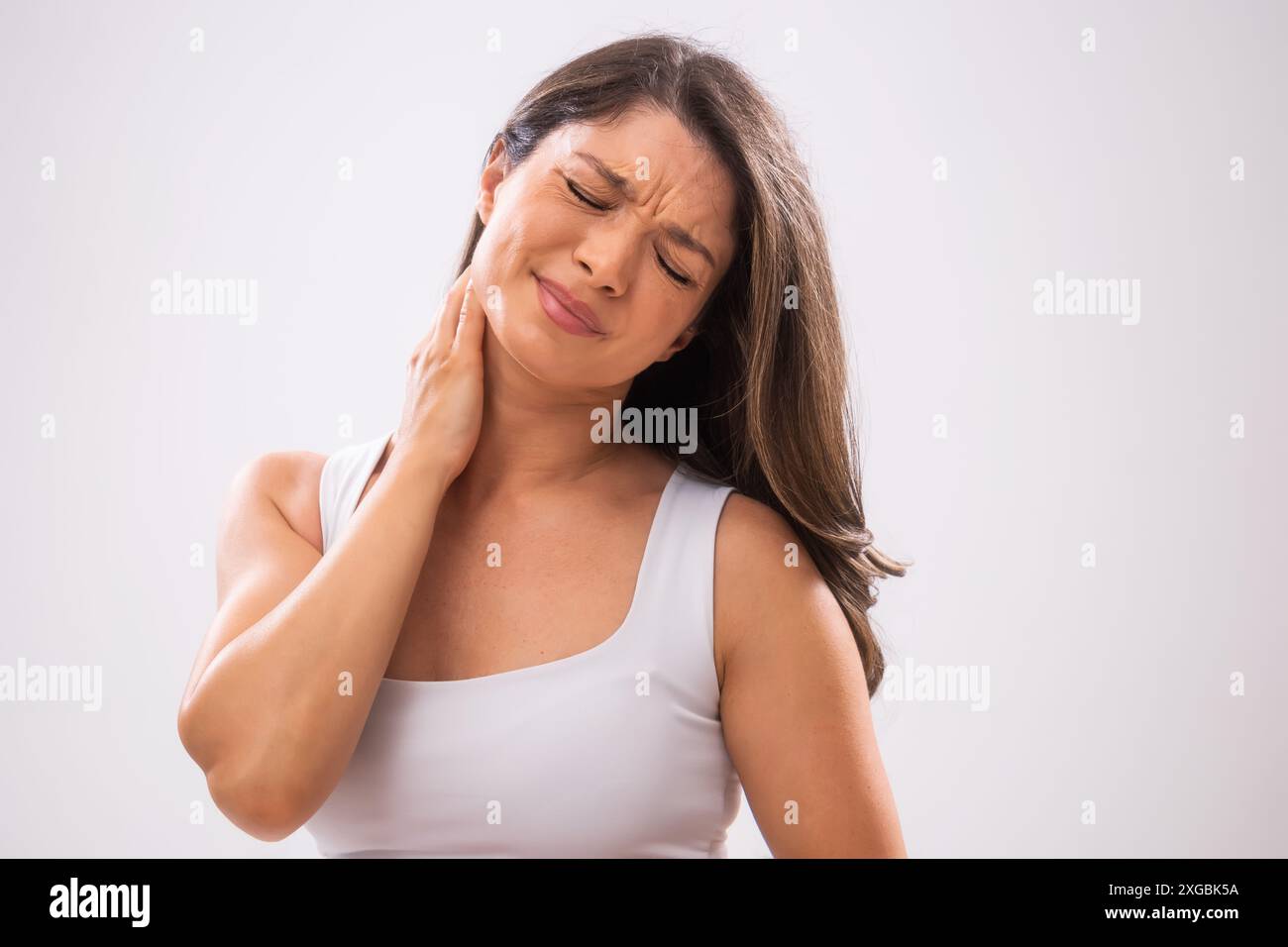 Portrait of adult woman who is having sprain in her neck Stock Photo ...