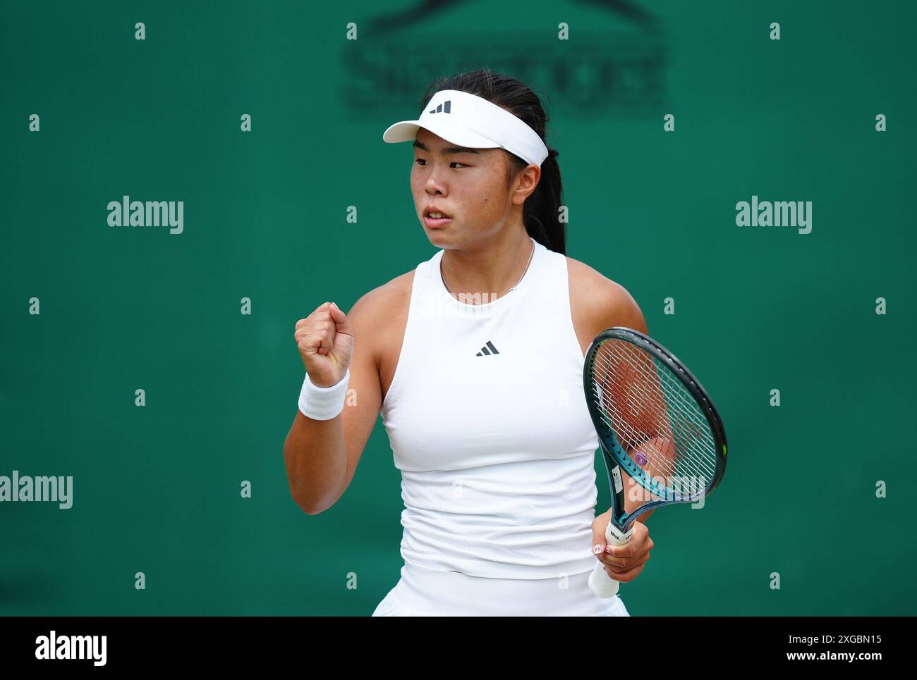 Mingge Xu reacts on day eight of the 2024 Wimbledon Championships at ...