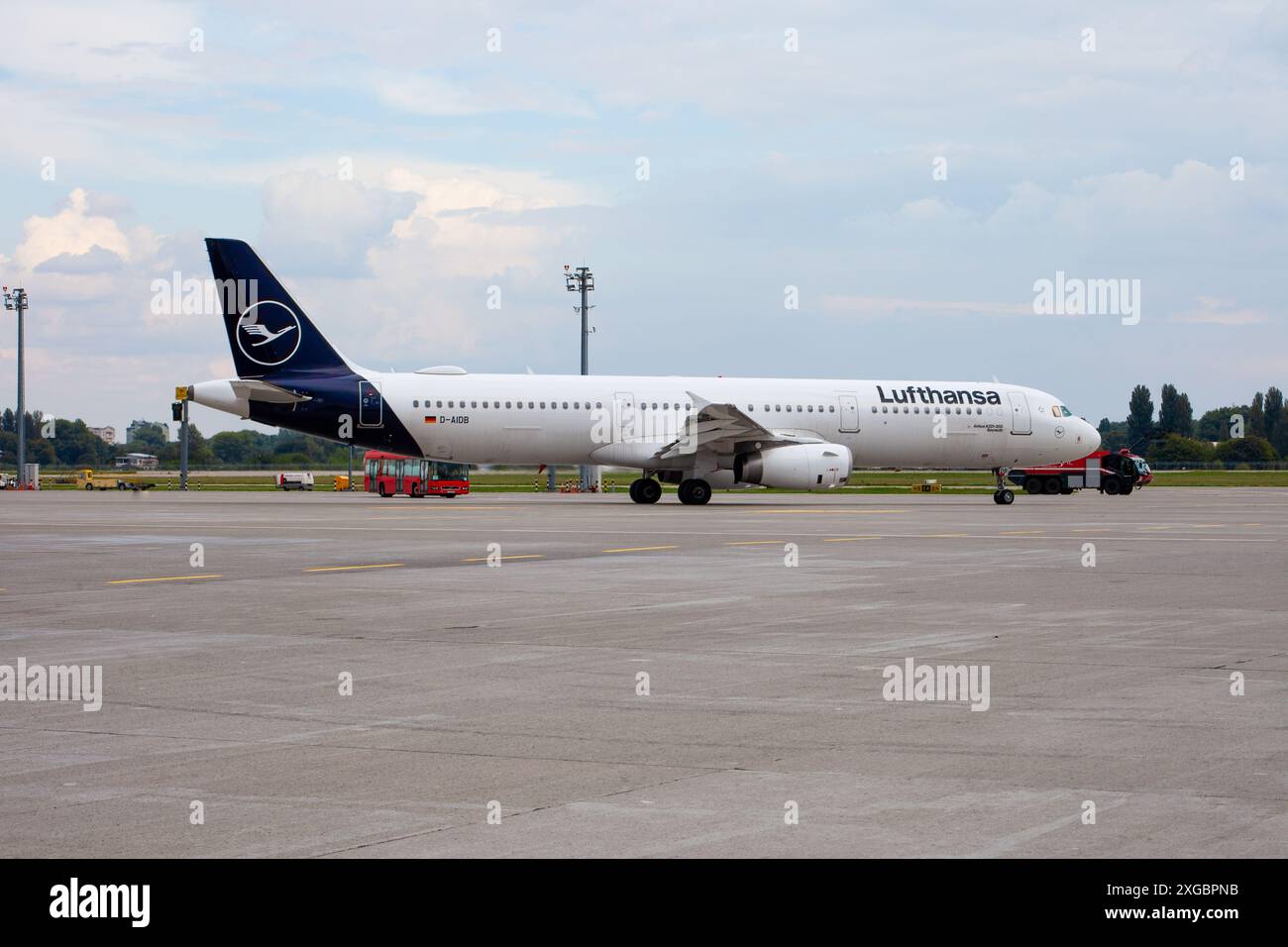 Passenger plane of the German airline Lufthansa D-AIDB. Airport apron ...