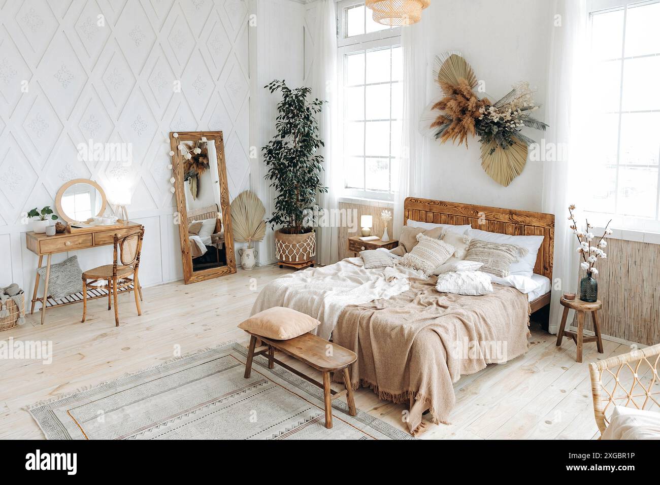 Cozy rustic bedroom with boho ethnic decor. Bright spacious apartment ...