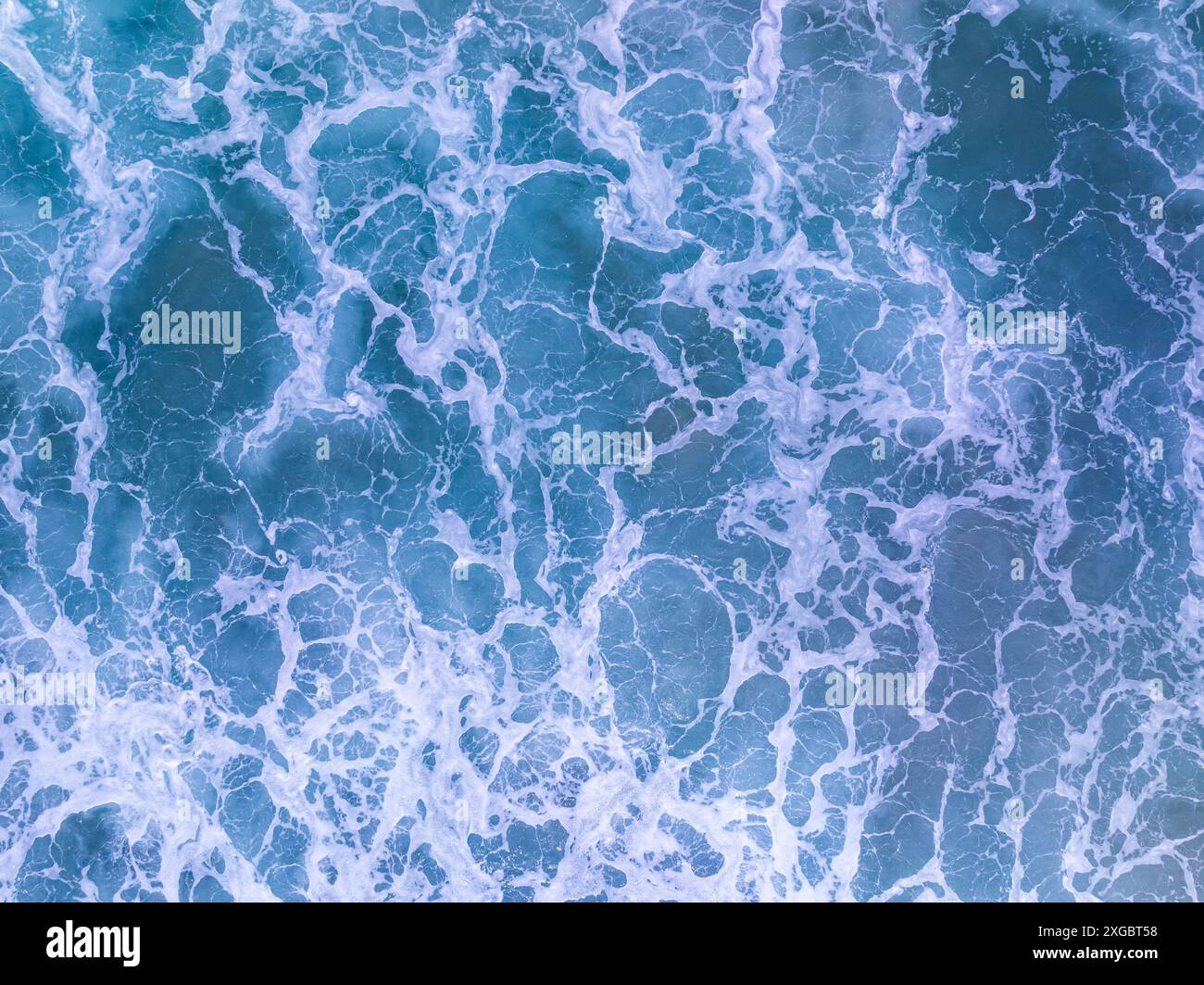 Aerial top view nature background of waves crashing in the ocean sea ...