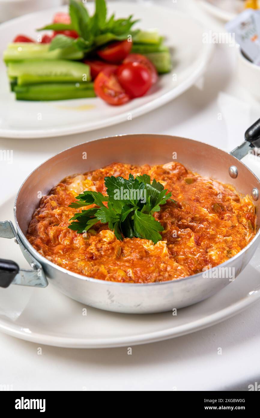 Turkish traditional menemen dish made with eggs, onions, peppers and ...