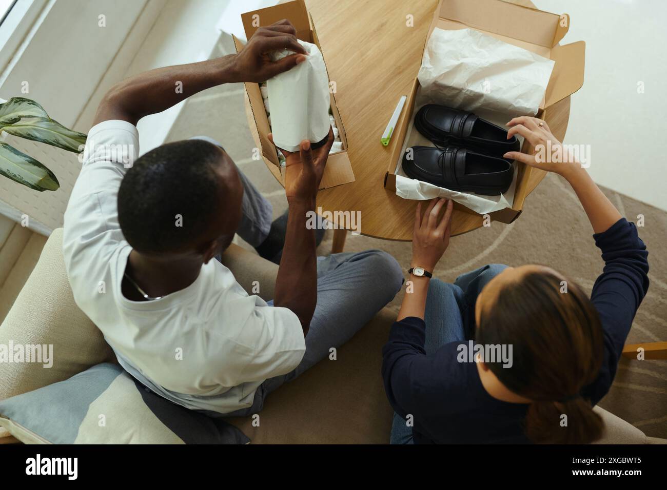 African man unpacking store hi-res stock photography and images - Alamy