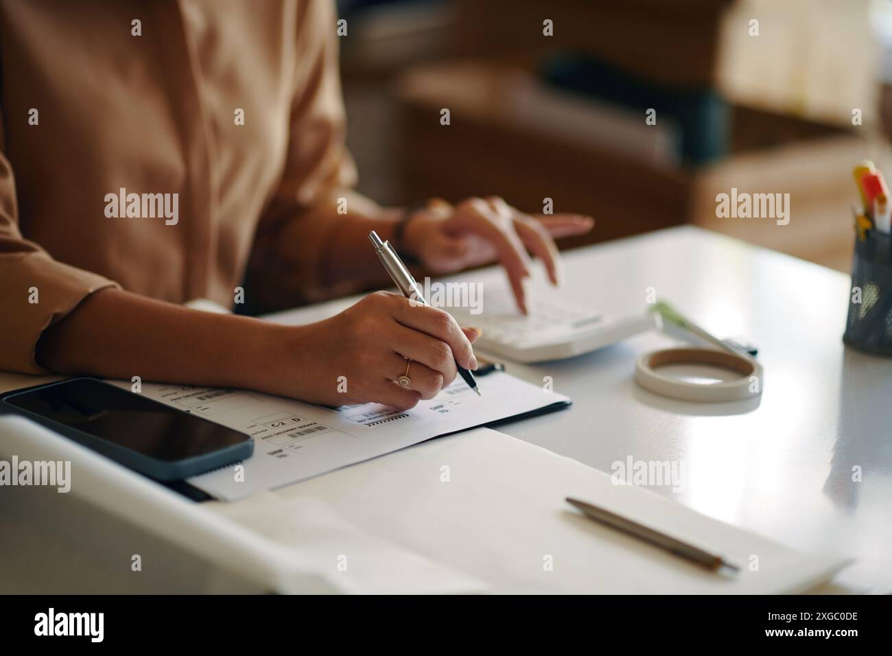 Woman working on documents hi-res stock photography and images - Alamy