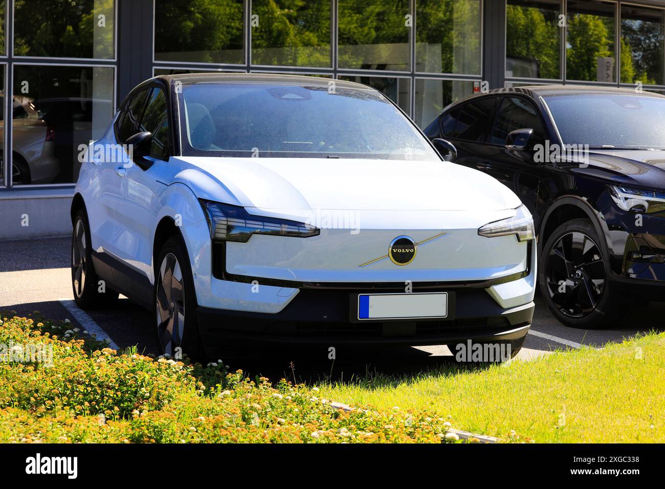 White Volvo EX30, a battery electric subcompact crossover SUV ...