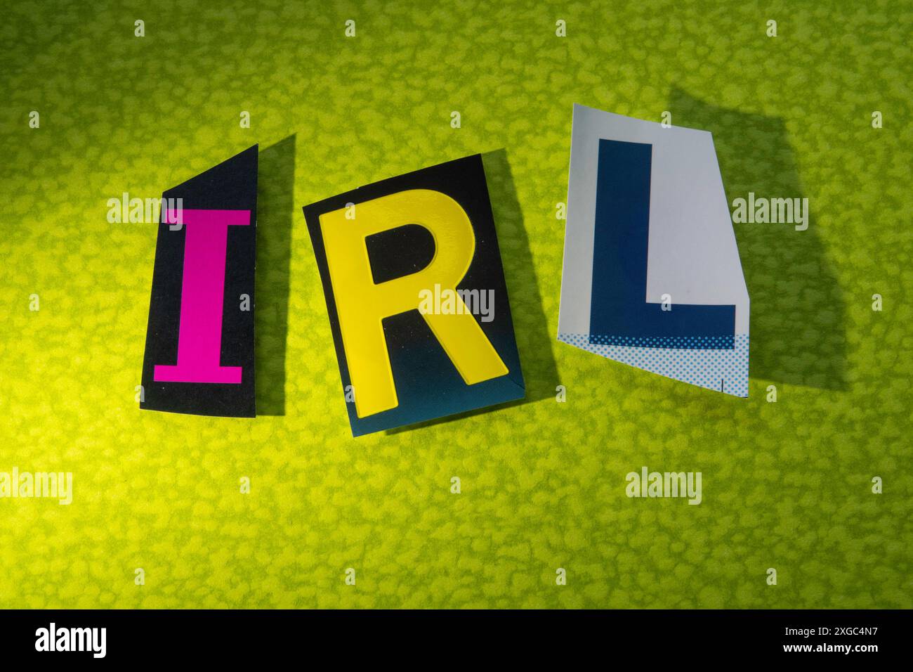 The acronym "IRL" slang using cut-out paper letters in the ransom note ...