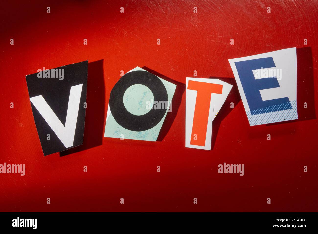 The Word "VOTE" using cut-out paper letters in the ransom note effect ...