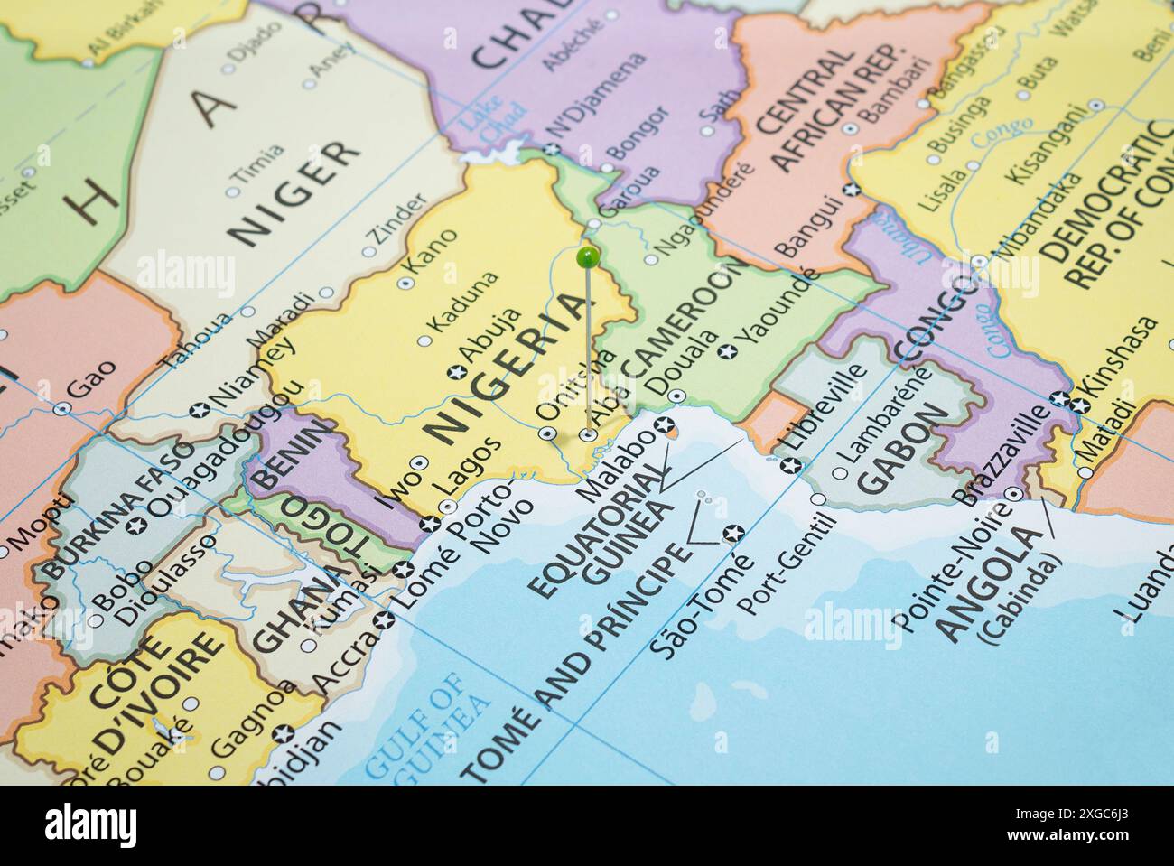 Close up to a Aba city with a green pin needle into Nigeria country ...