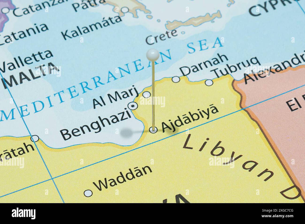 Close up to a Ajdabiya city with a white pin needle into Libya country ...