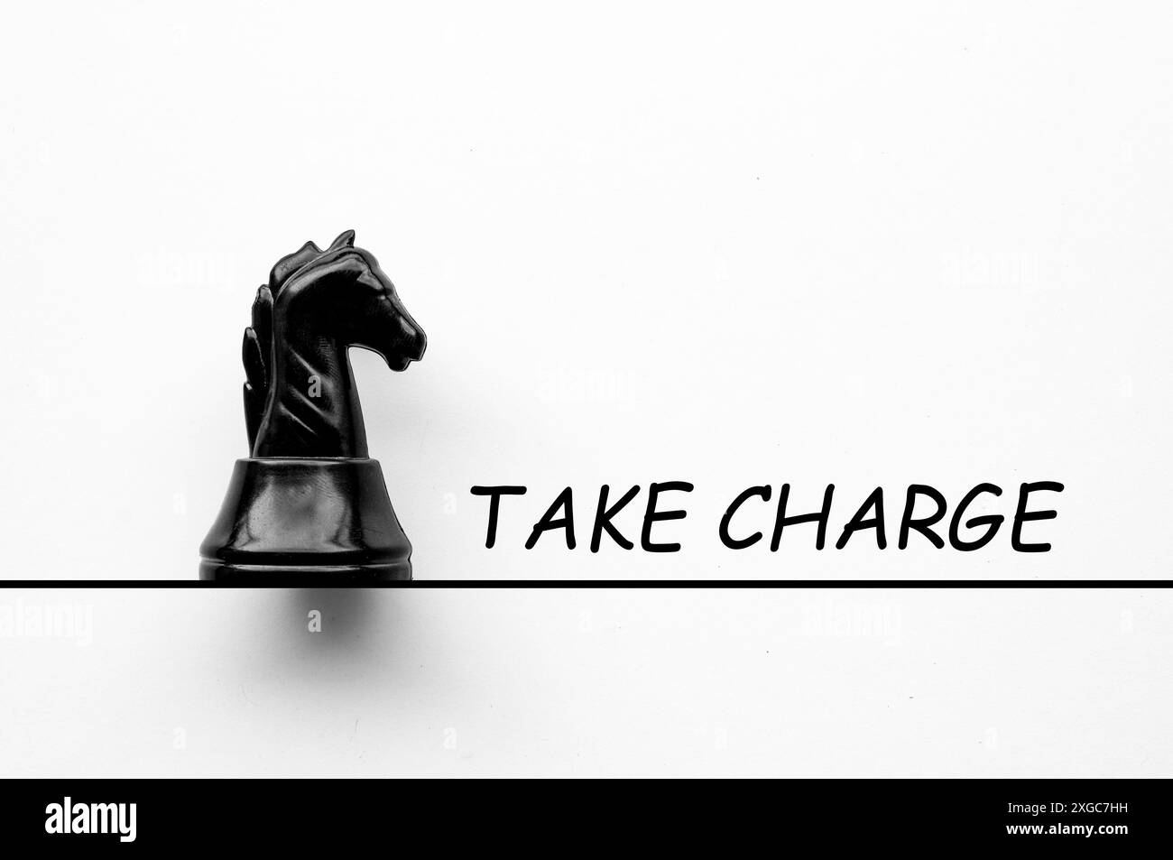 Take charge text with black knight chess on white cover background ...