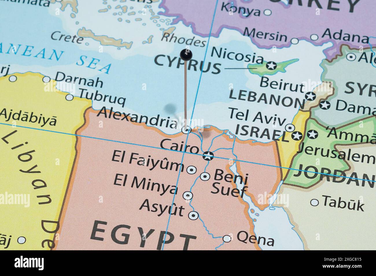 Close up to a Alexandria city with a black pin needle into Egypt ...