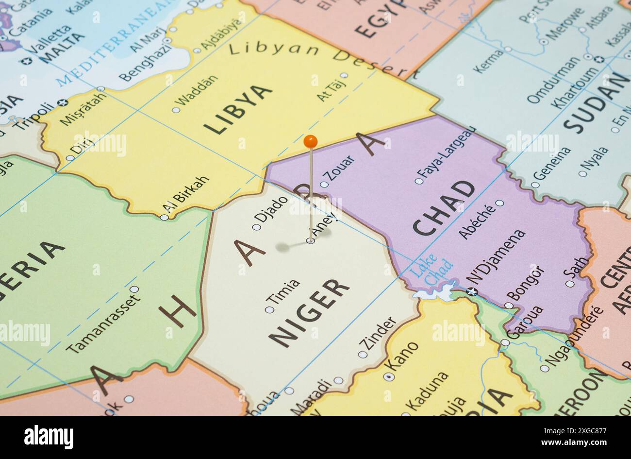 Close up to a Aney city with an orange pin needle into Niger country ...