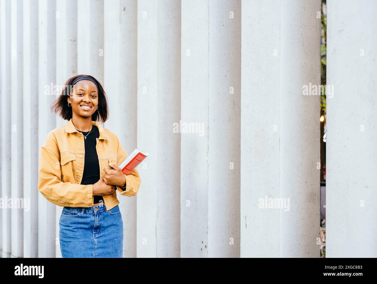 Portrait of black female student at campus looking at camera Stock ...