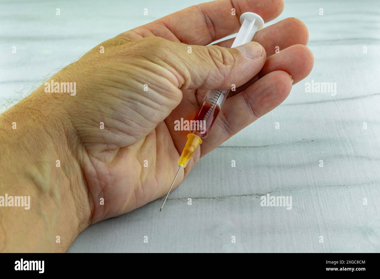 Fentanyl opioids morphine Krak drugs and medicines a man holds a ...