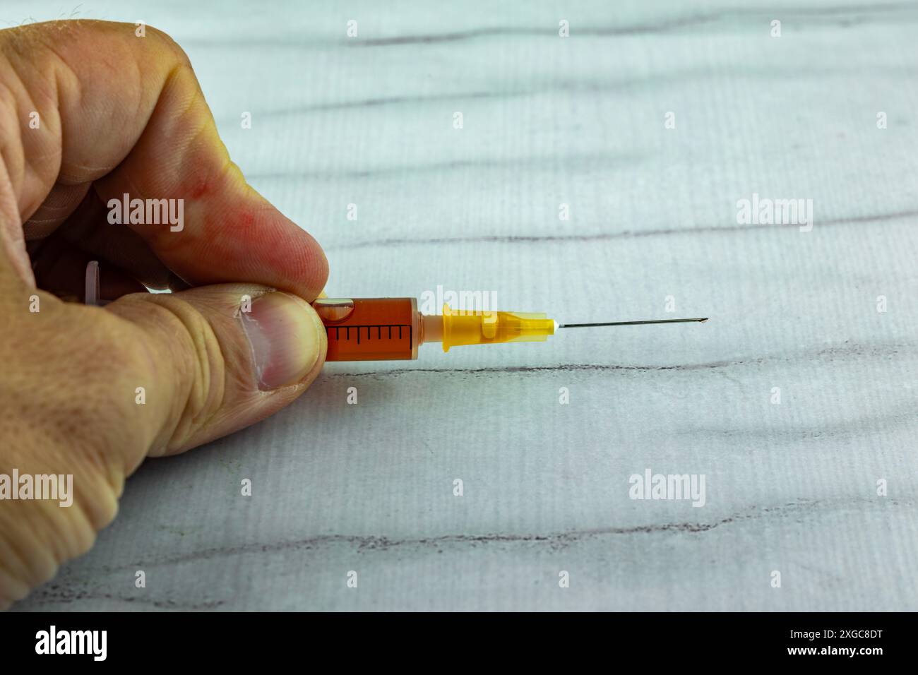 Fentanyl opioids morphine Krak drugs and medicines a man holds a ...