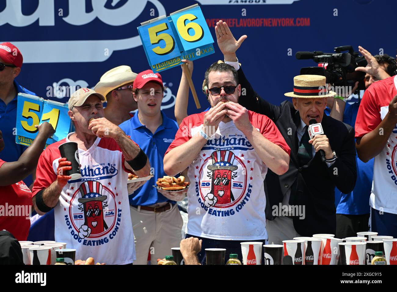 Professional competitive eater Patrick Bertoletti consumes 58 hot dogs ...
