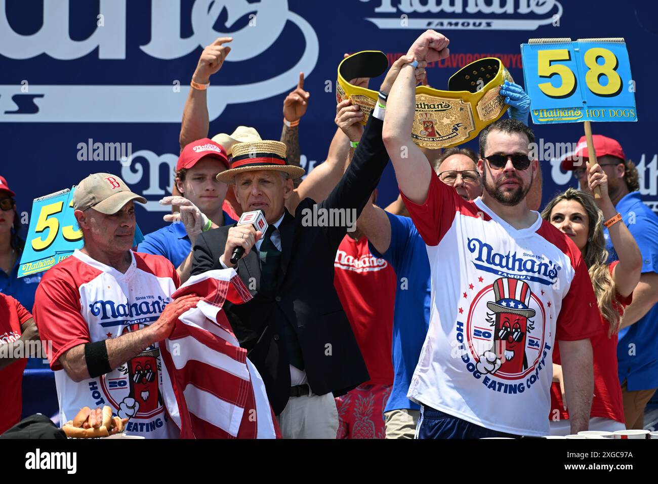 Professional competitive eater Patrick Bertoletti consumes 58 hot dogs ...