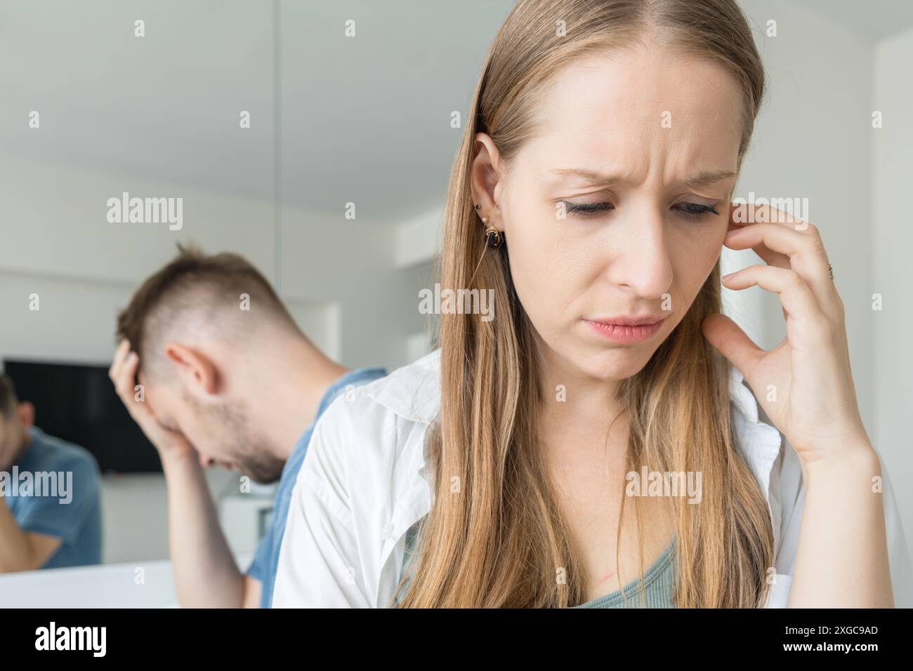 Unhappy Sad And Upset Couple In Argument With Disappointed Woman