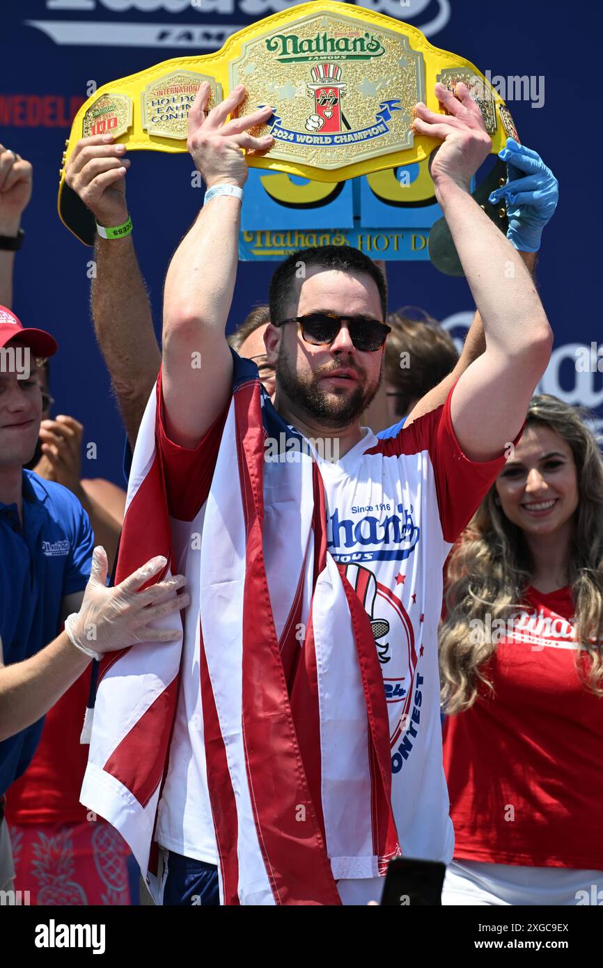 Professional competitive eater Patrick Bertoletti consumes 58 hot dogs ...