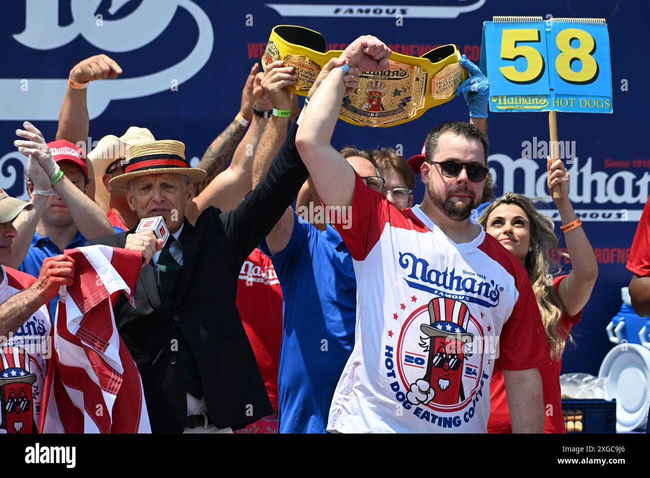 Professional competitive eater Patrick Bertoletti consumes 58 hot dogs ...
