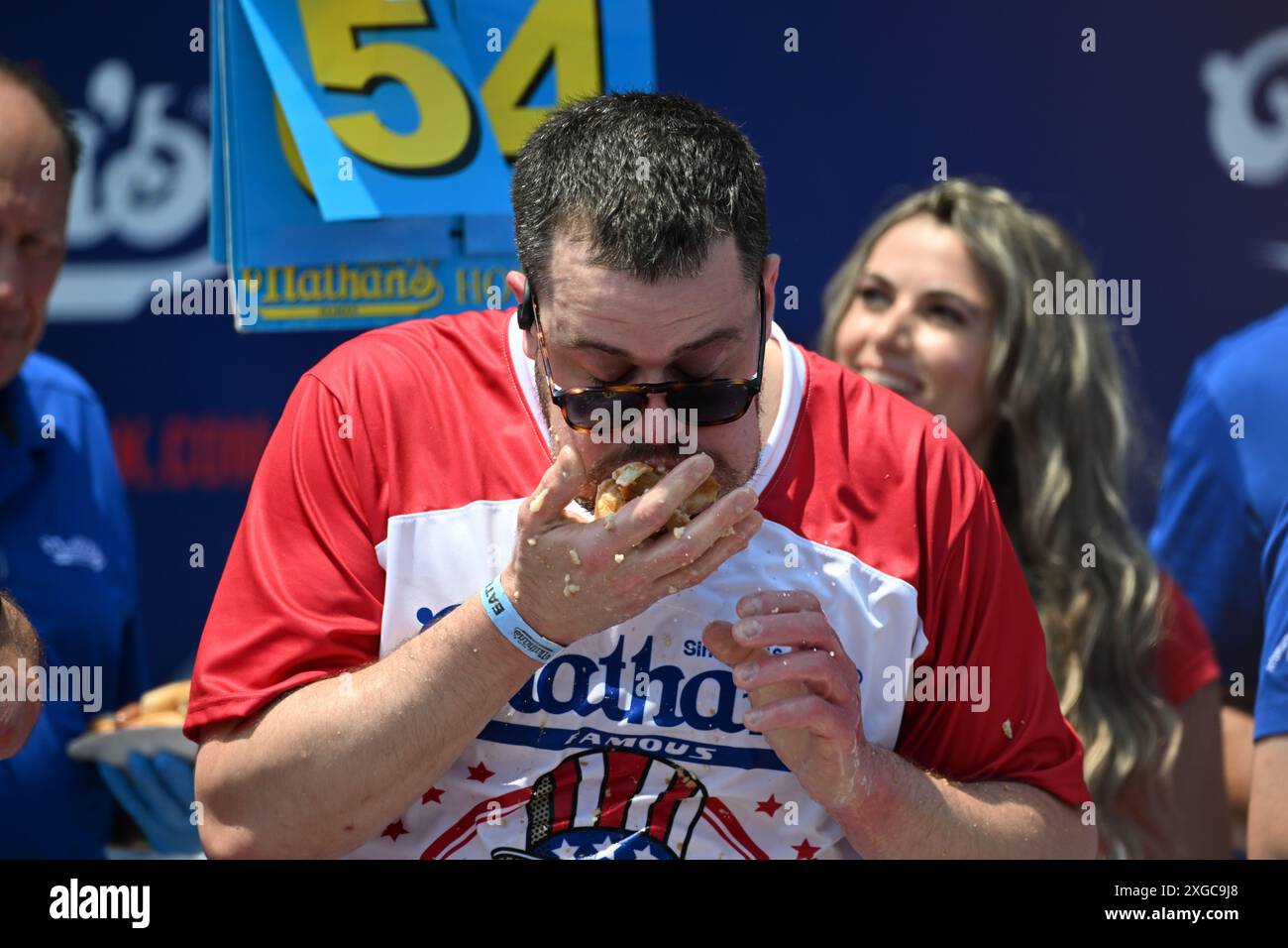 Professional competitive eater Patrick Bertoletti consumes 58 hot dogs ...