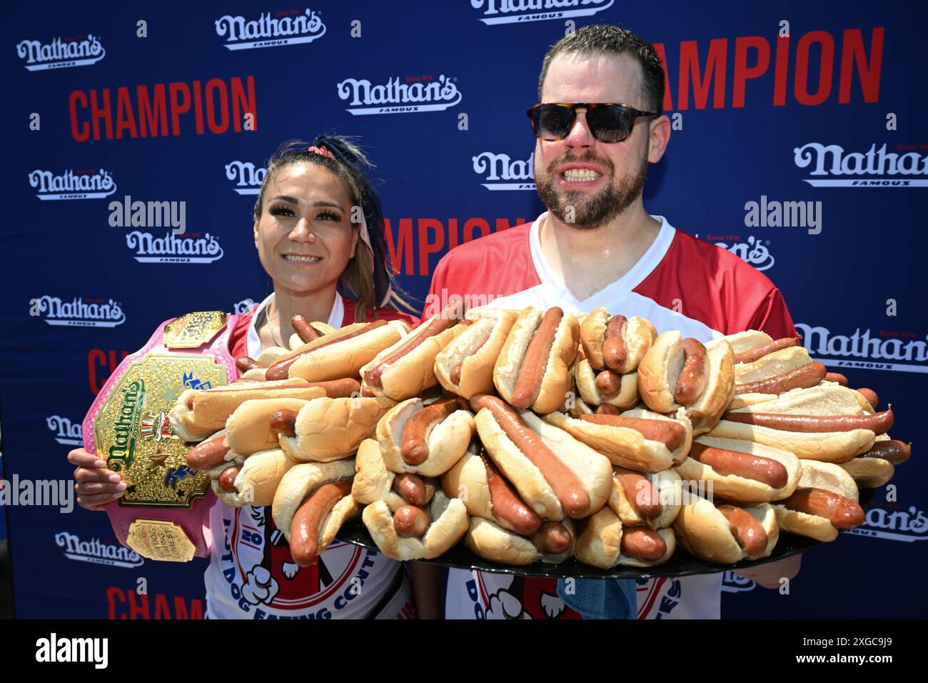 Professional competitive eater Patrick Bertoletti consumes 58 hot dogs ...