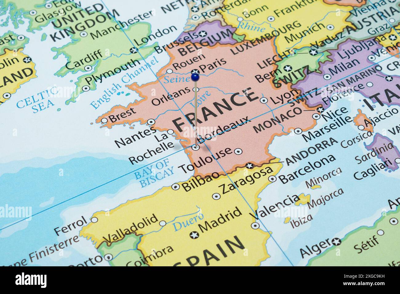 Close up to a Bordeaux city with a blue pin needle into France country ...