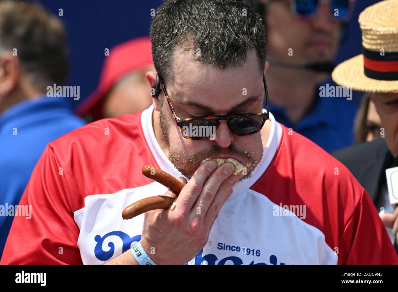 Professional competitive eater Patrick Bertoletti consumes 58 hot dogs ...