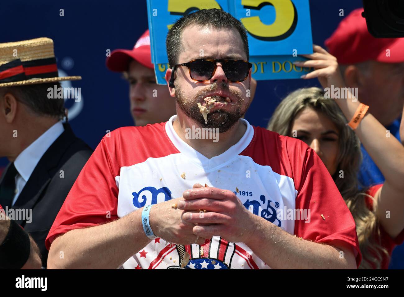 Professional competitive eater Patrick Bertoletti consumes 58 hot dogs ...