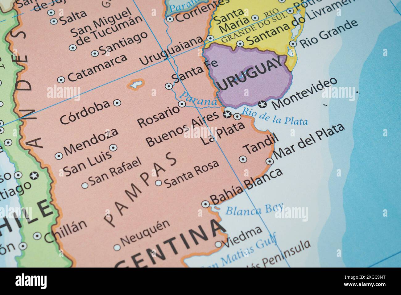 Macro photo of Argentina and Uruguay political maps with country frontiers and most importants ...