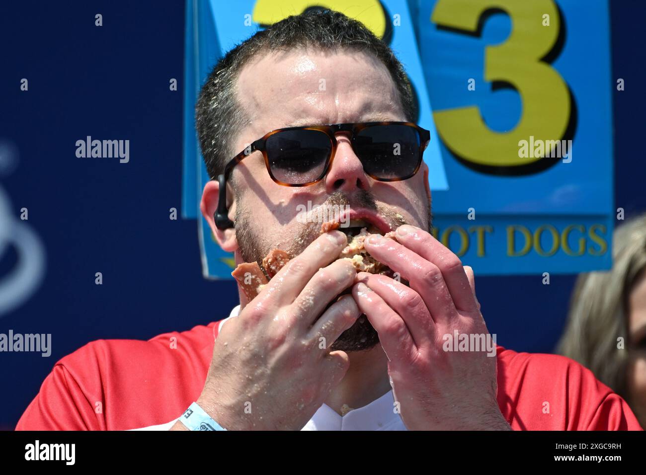 Professional competitive eater Patrick Bertoletti consumes 58 hot dogs ...