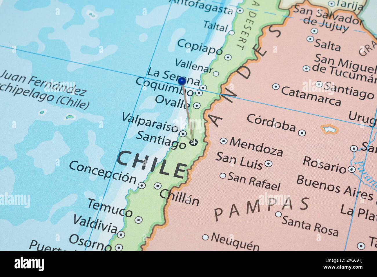 Macro Photo of Santiago city with a blue pin needle into Chile country ...