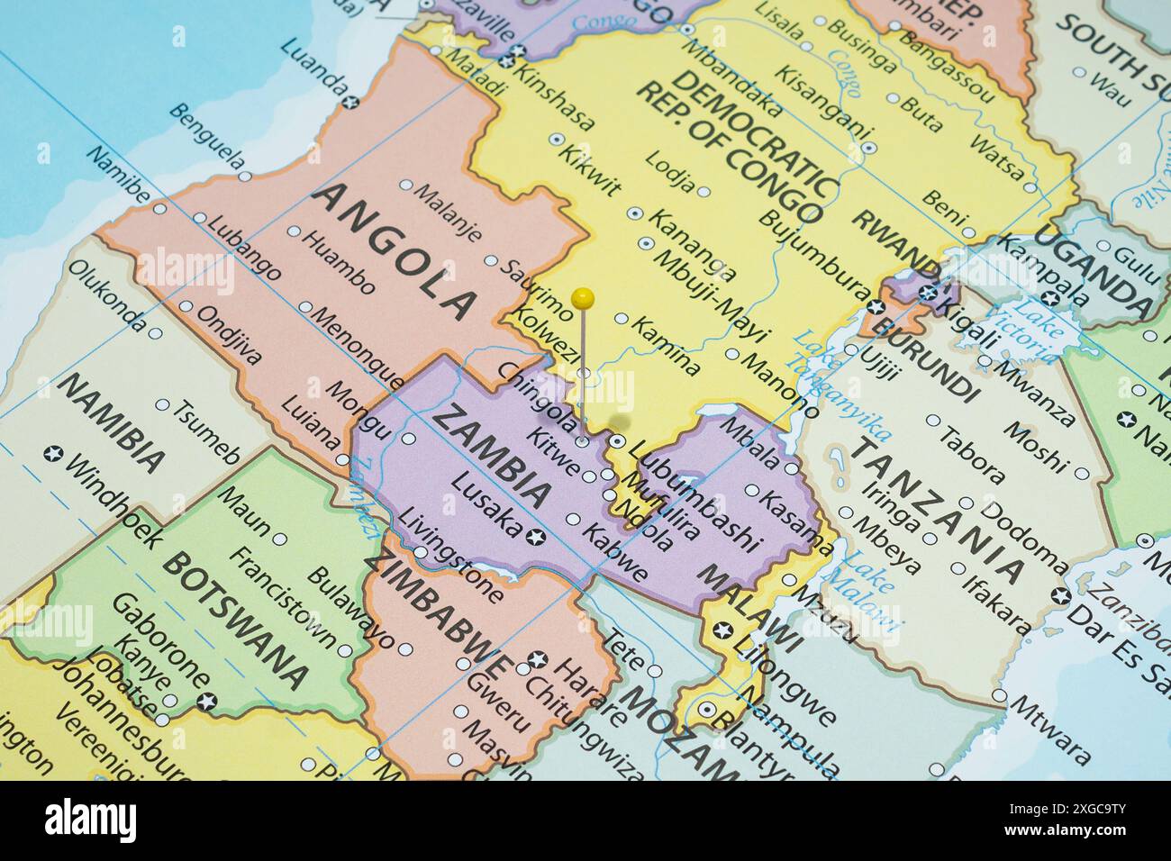 Close up to a Chingola city with a yellow pin needle into Zambia ...