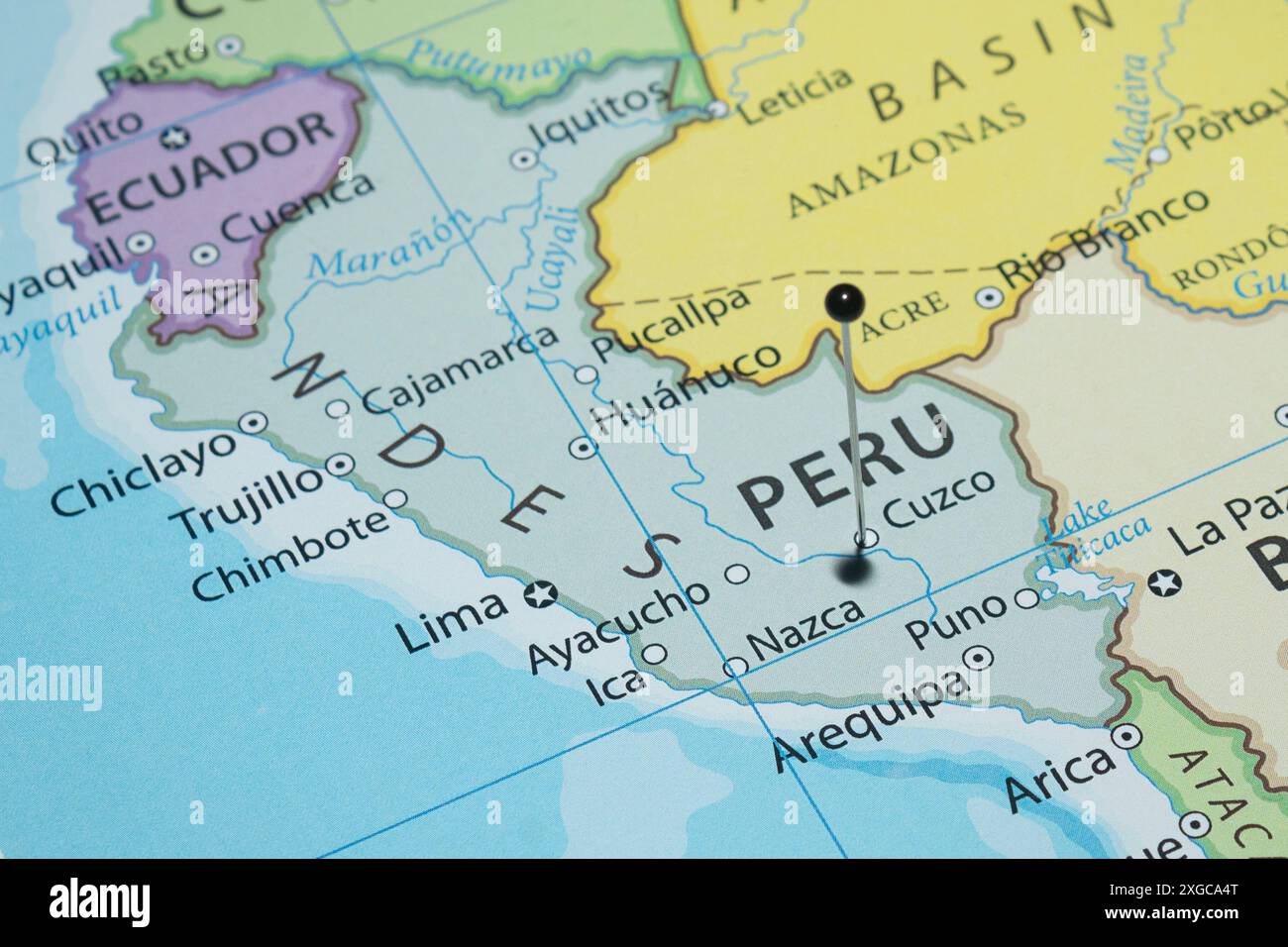 Close up to a Cuzco city with a black pin needle into Peru country ...