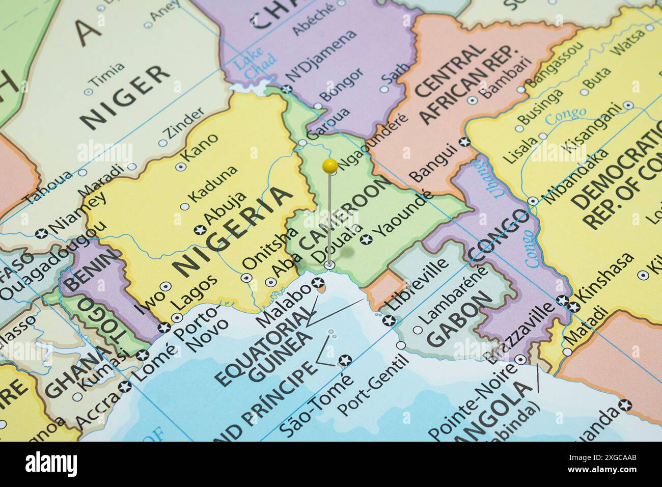 Close up to a Douala city with a Yellow pin needle into Cameroon ...