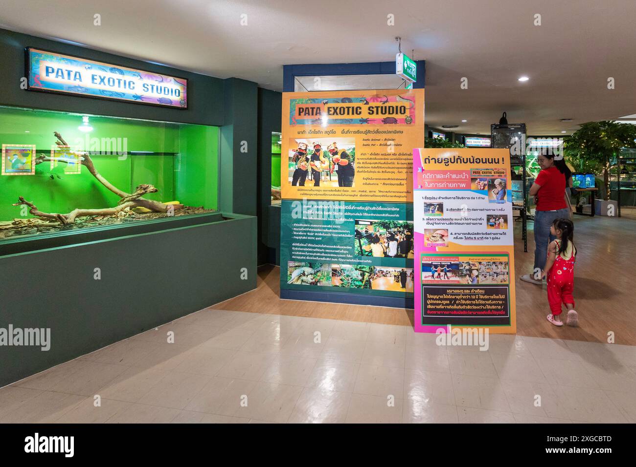 An advertisement with pictures for an exotic show with animals is seen ...