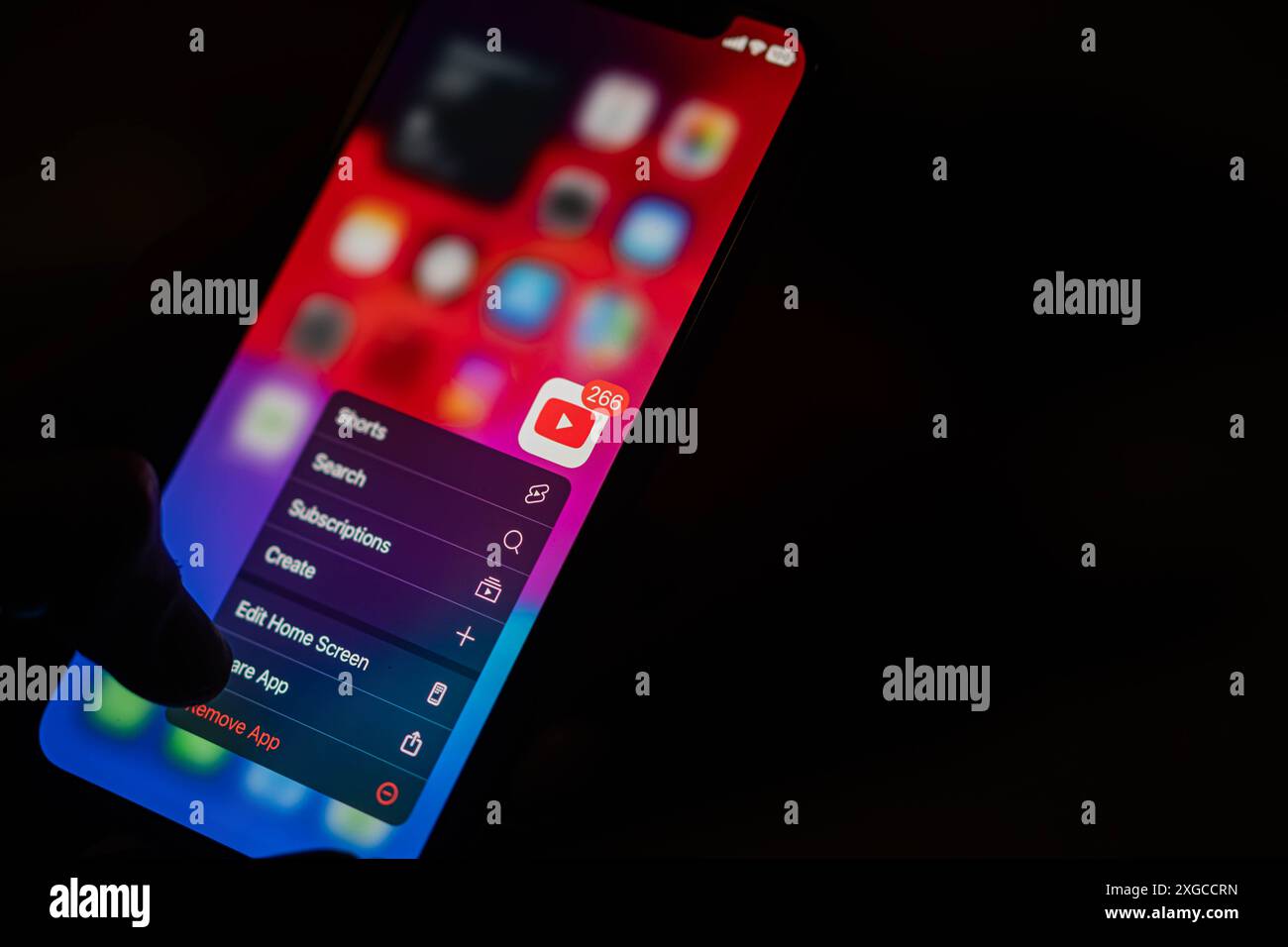 A close-up of a smart phone screen displaying the YouTube app with a ...