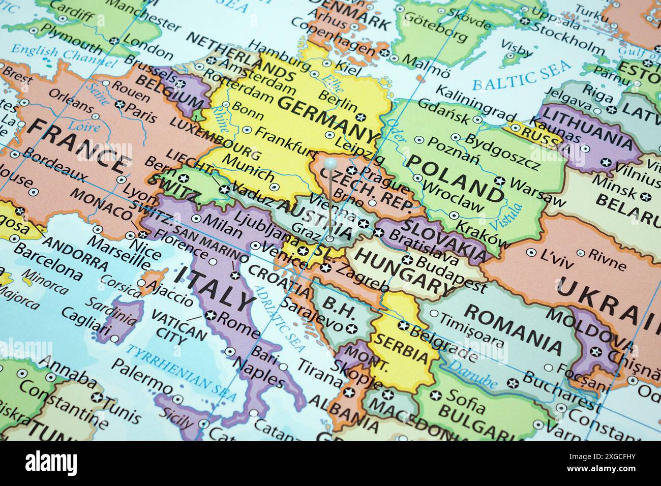 Close up to a Graz city with a white pin needle into Austria country ...