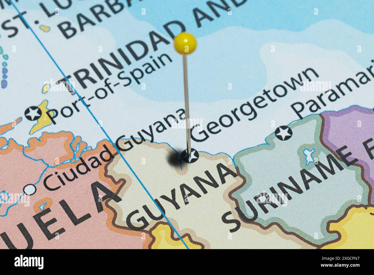 Close up to a Georgetown city with a yellow pin needle into Guyana ...