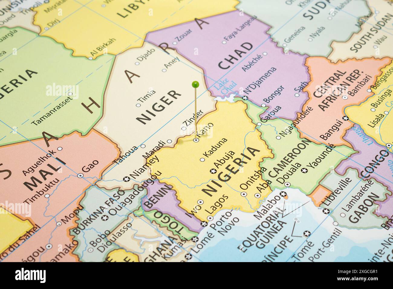 Close up to a Kano city with a green pin needle into Nigeria country ...