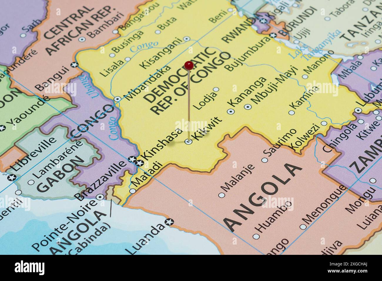Close up to a Kikwit city with a red pin needle into Democratic ...