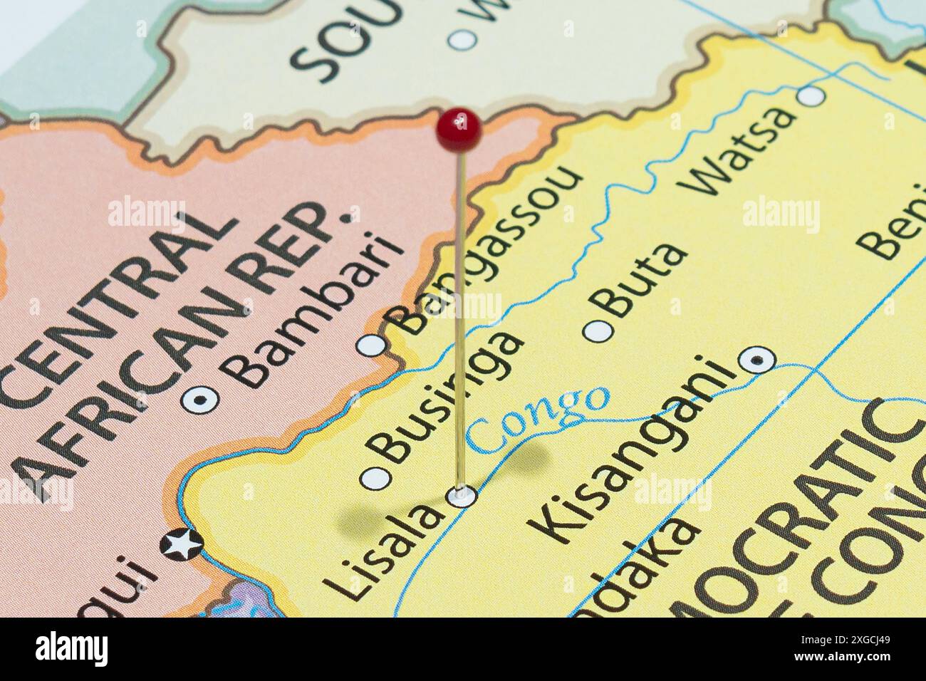 Close up to a Lisala city with a red pin needle into Democratic ...
