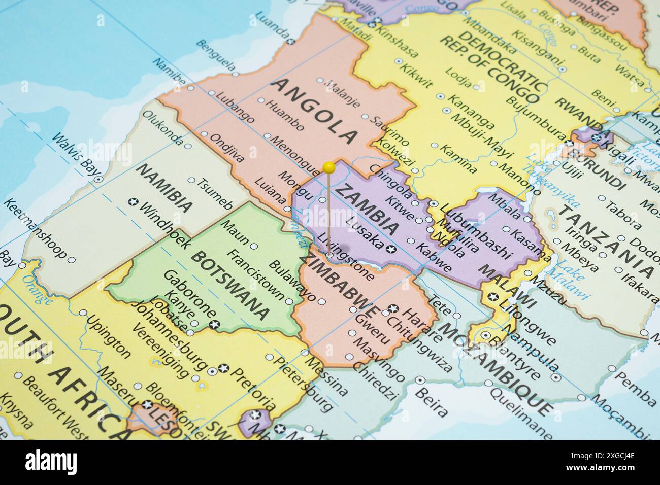 Close up to a Livingstone with a yellow pin needle into Zambia country ...