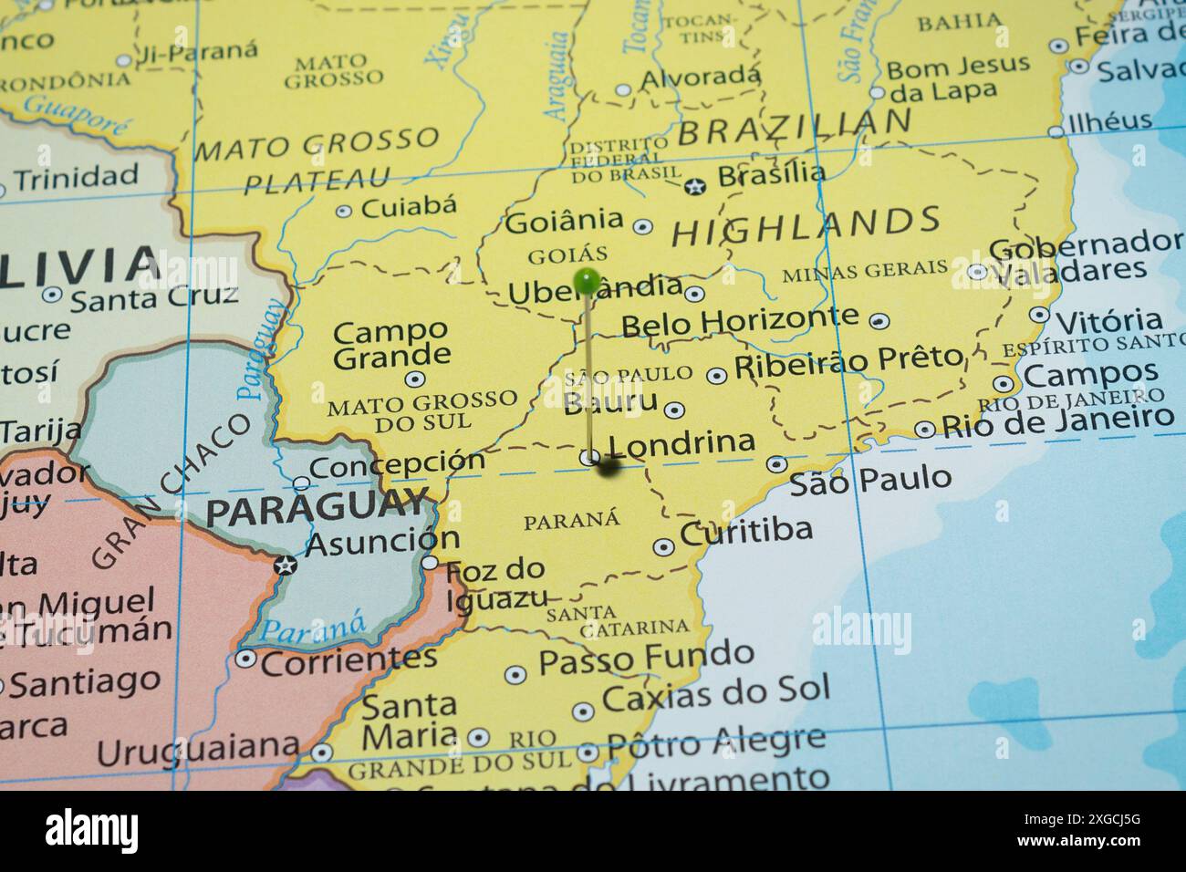 Close up to a Londrina city with a green pin needle into Brazil country ...