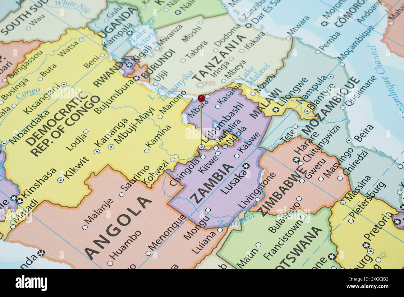 Close up to a Lubumbashi city with a red pin needle into Democratic ...