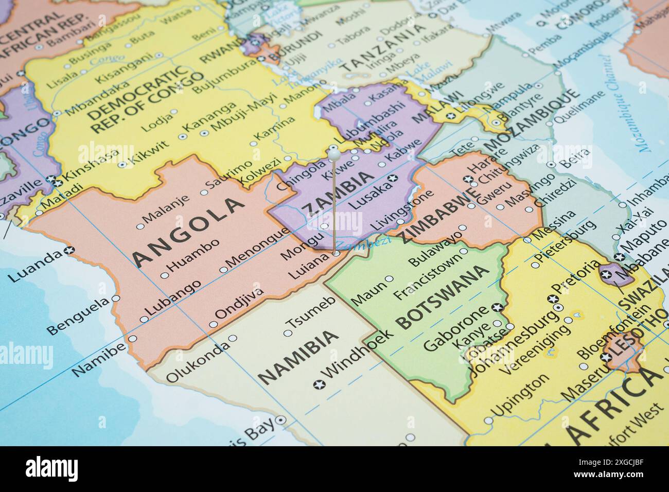 Close up to a Luiana with a white pin needle into Angola country ...